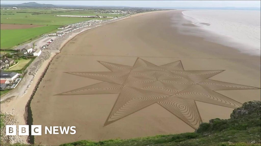 Brean beach is dazzled by Simon Beck's 85m sand star - BBC News