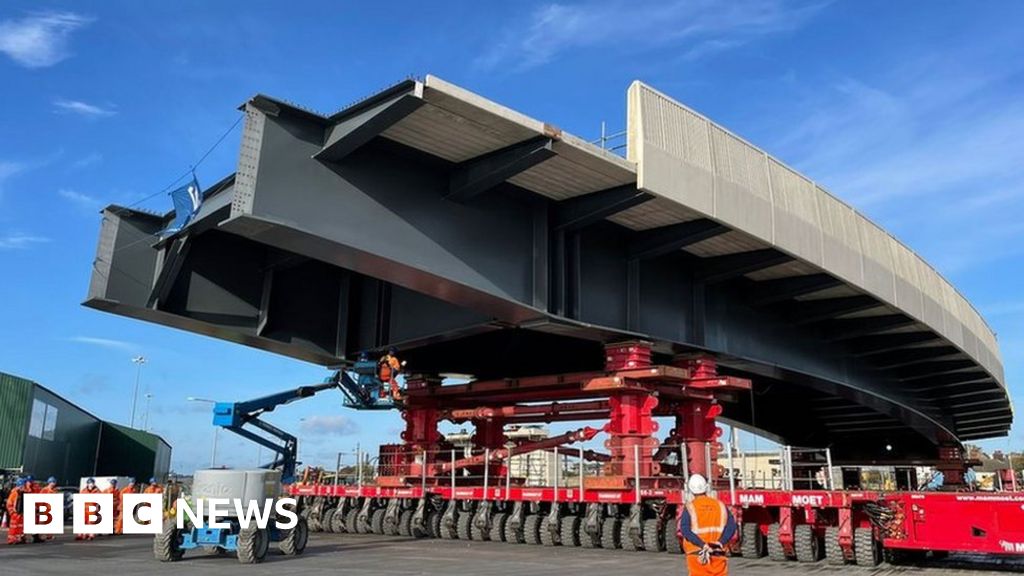 First piece of Lowestoft's Gull Wing Bridge being moved into place ...