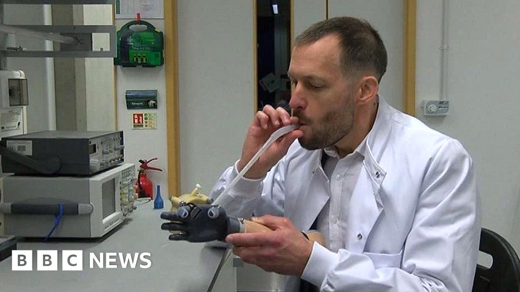 Hand prosthetic controlled by breathing
