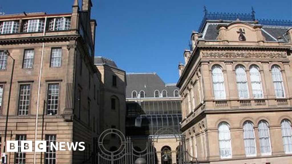 Man charged after visiting professor punched in face and robbed in ...