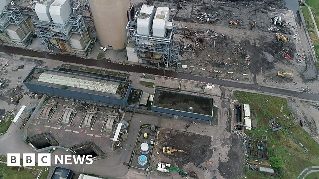 Controlled explosions and huge diggers demolish Longannet