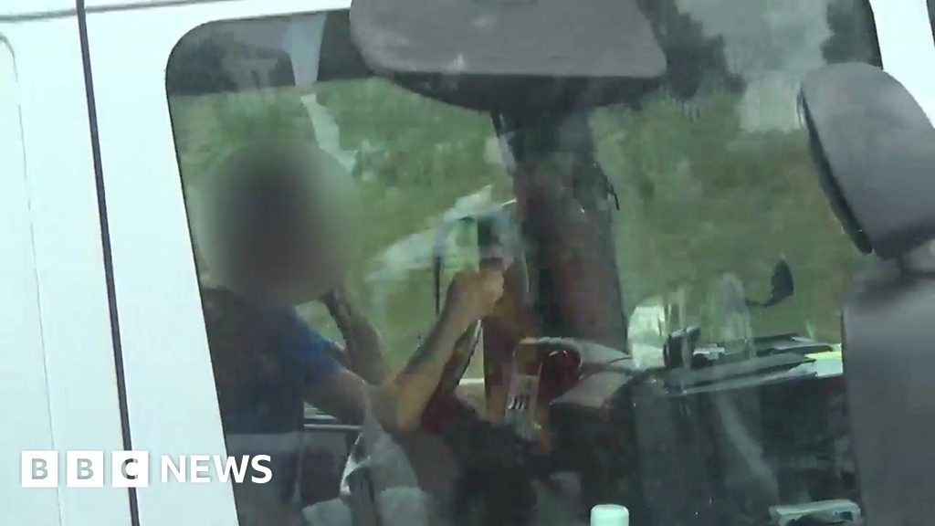 Driver caught using two mobile phones on M6 in Cheshire - BBC News