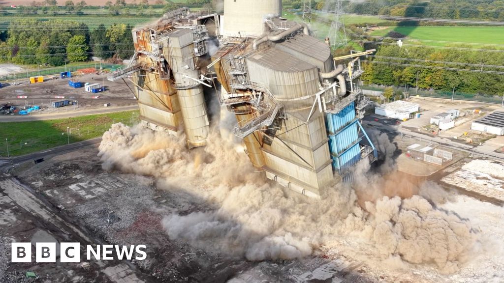 Watch 'triple explosive demolition' at power station - BBC News