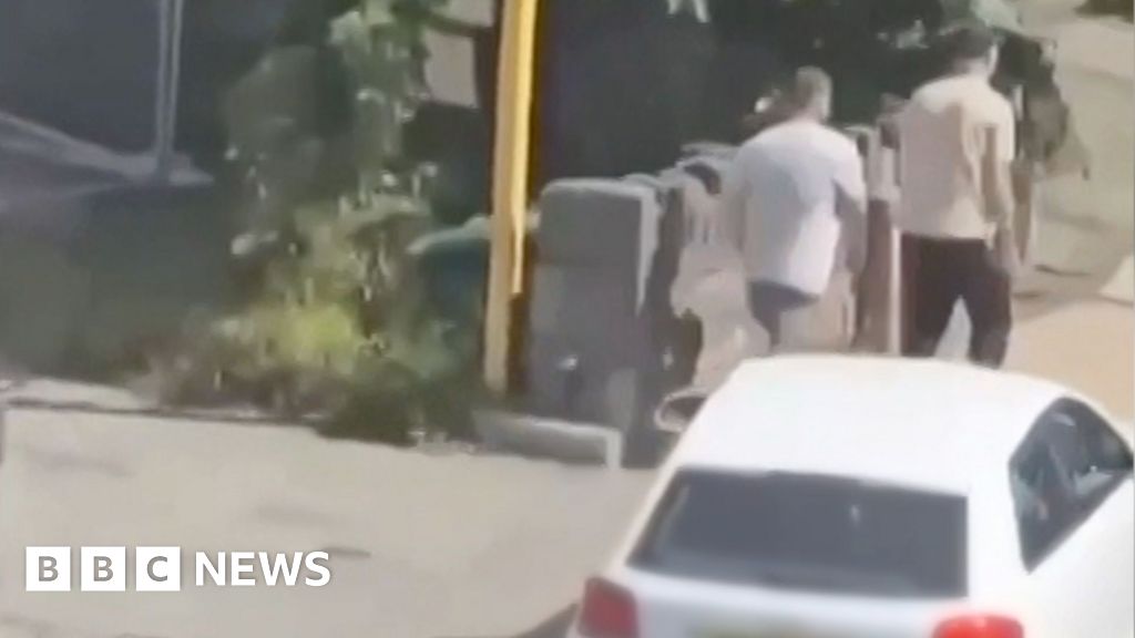 Bethesda: CCTV captures teen using car 'as a weapon' after fight - BBC News
