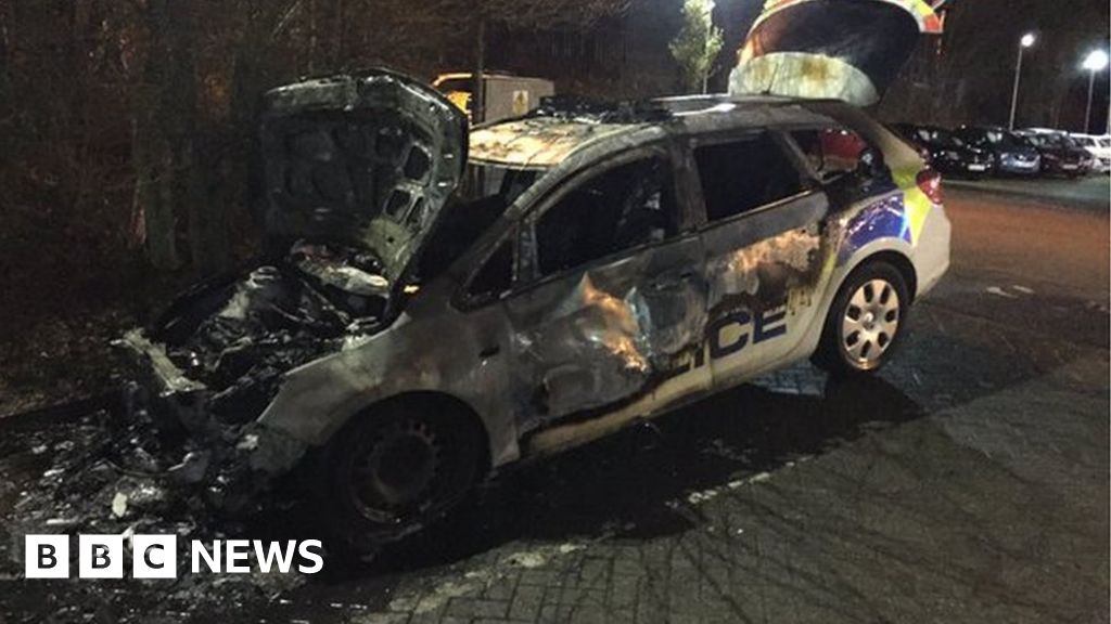 Police car destroyed in arson attack - BBC News