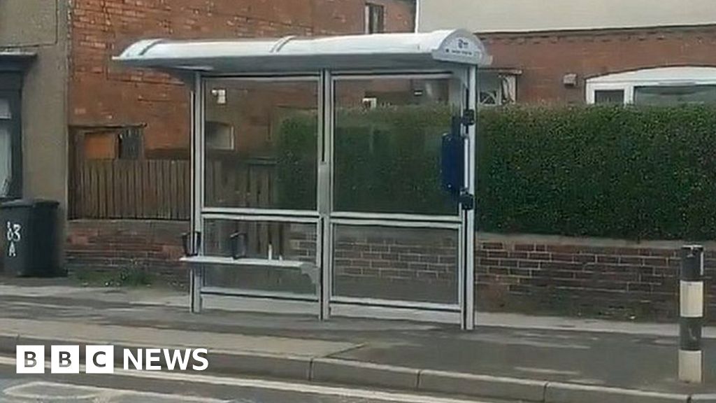 Bus shelter built on road with no bus service - BBC News