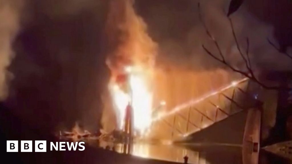 Watch: Burning Canadian bridge collapses into river - BBC News