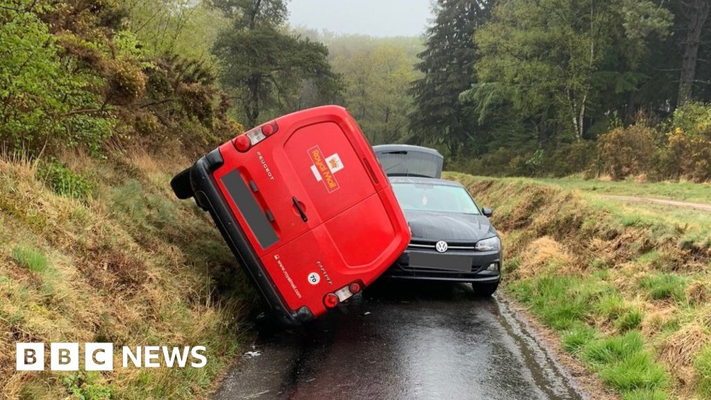 Post van and car go 'a tad wrong' in Devon crash - BBC News