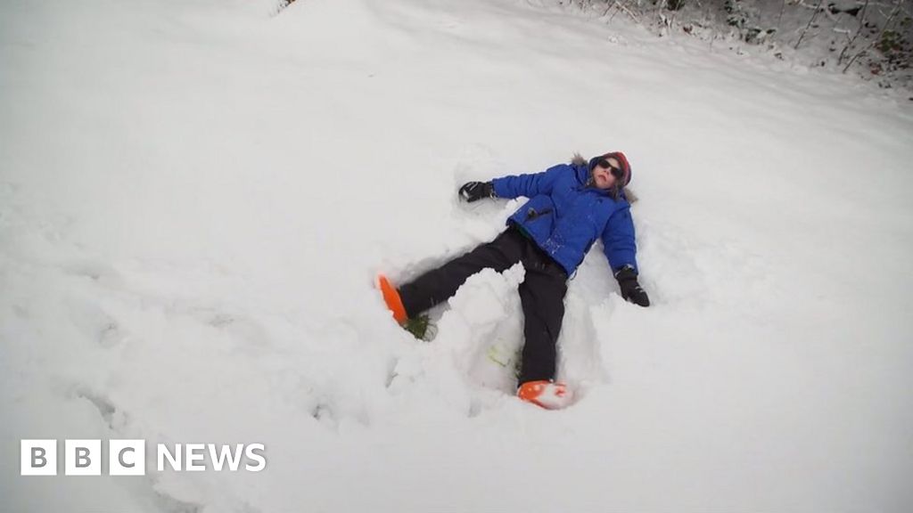 Snow angels to snow ploughs: A day spent in the snow - BBC News