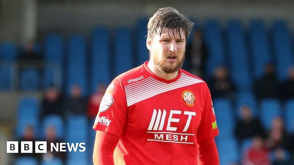Ken Oman: Ex-footballer avoids prison for assault during match - BBC News