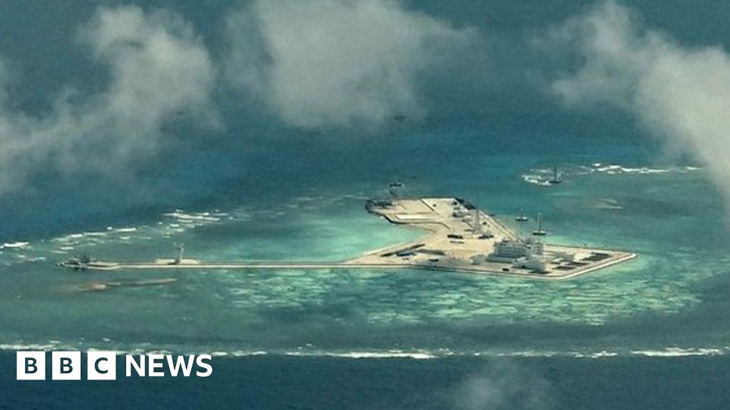 Flying close to Beijing's new South China Sea islands - BBC News