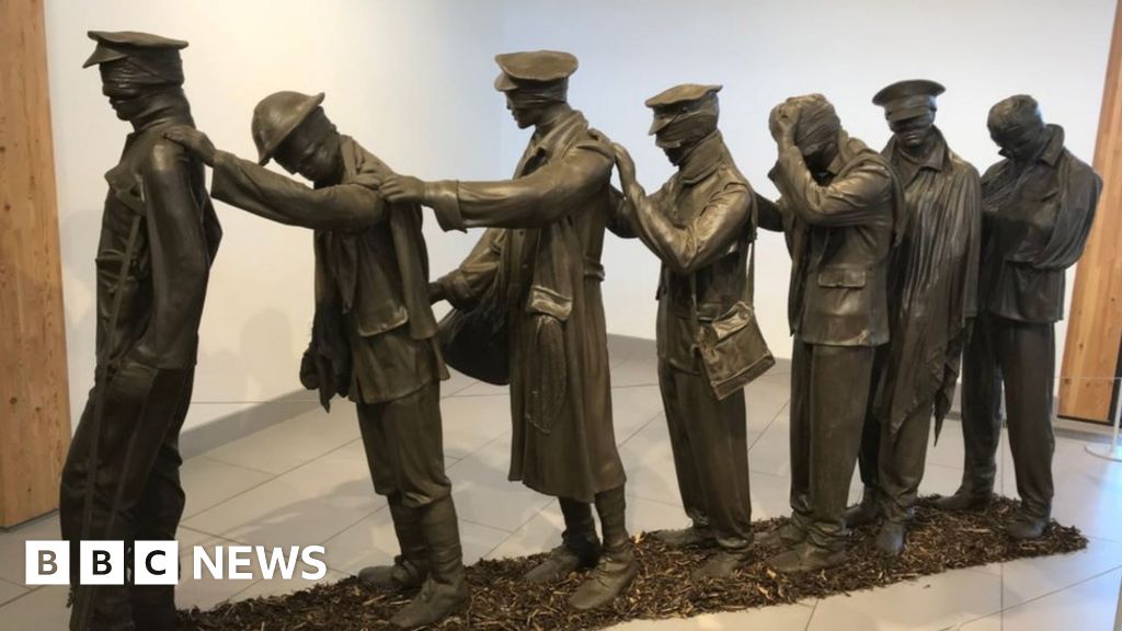 Blind soldiers sculpture to be unveiled in Llandudno - BBC News