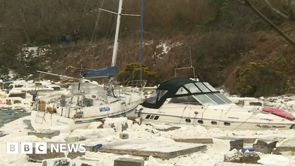 80 boats damaged or sunk by storm at Holyhead marina - BBC News