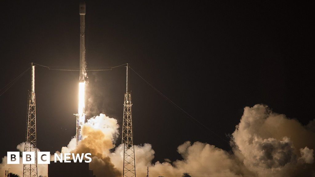 Space X rocket successfully launches and then lands at sea - BBC News