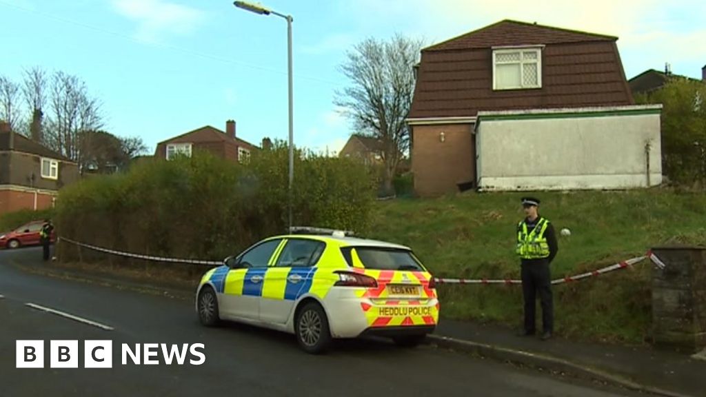 Murder arrest after woman's body found in Neath house - BBC News