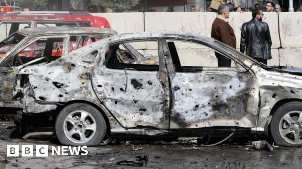 Syria conflict: Car bomb targets Damascus police club - BBC News