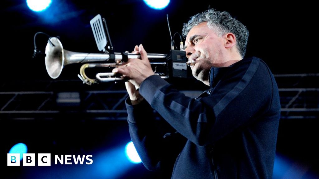 James band member raffling classic Sit Down silver disc