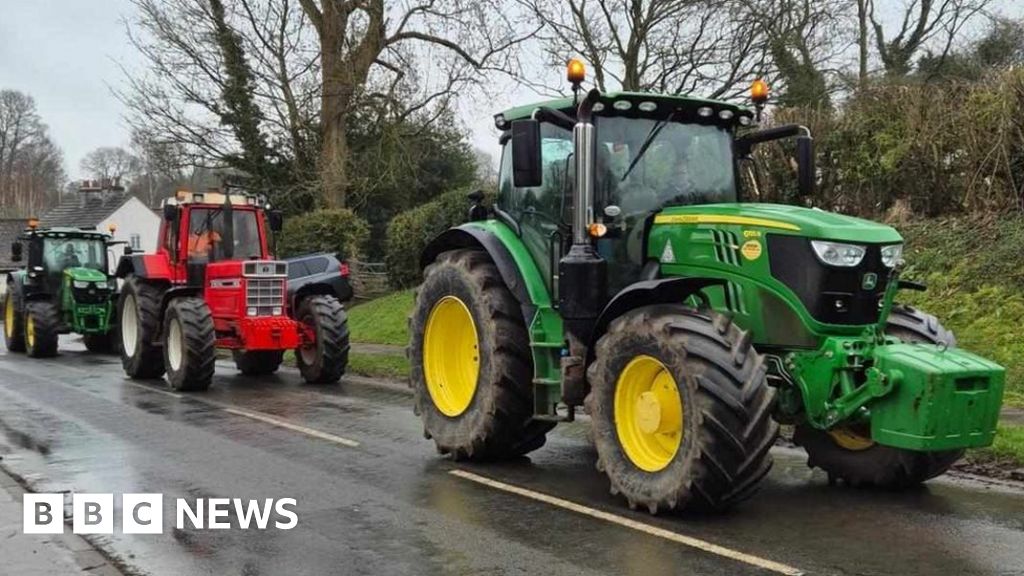 Hundreds of tractors join in annual charity parade - BBC News