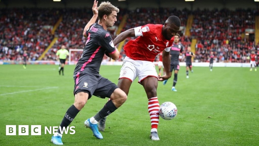 Four arrests after trouble at Barnsley v Leeds United match - BBC News