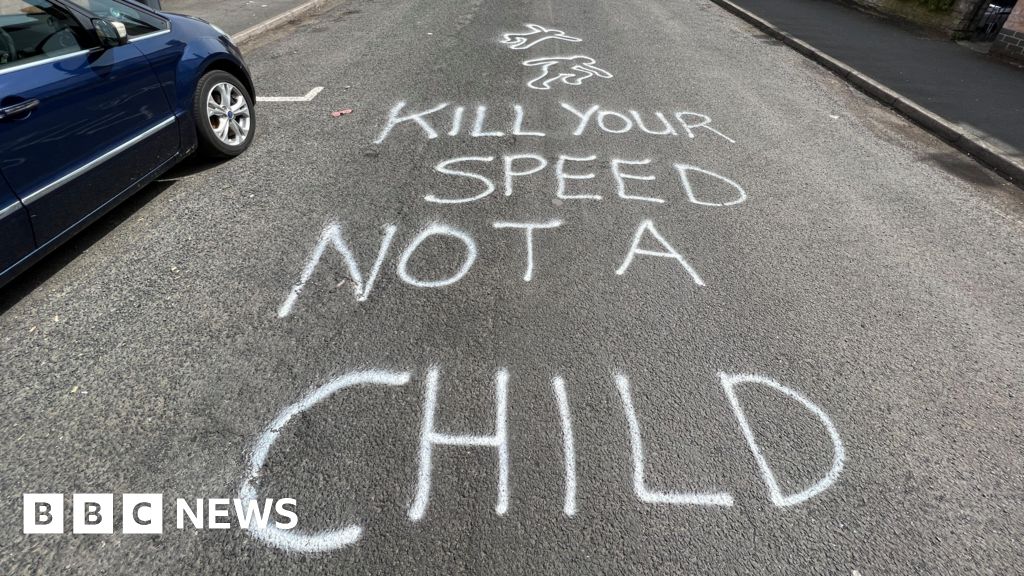 Graffiti appears on road after Birmingham hit-and-run - BBC News