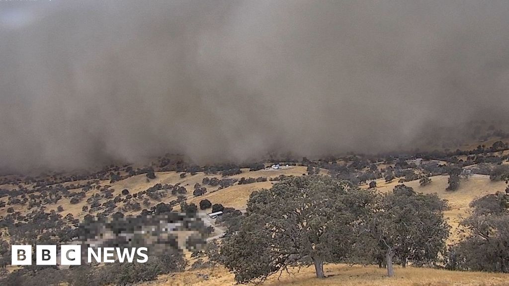 Watch: Giant wall of dust sweeps across central California - BBC News
