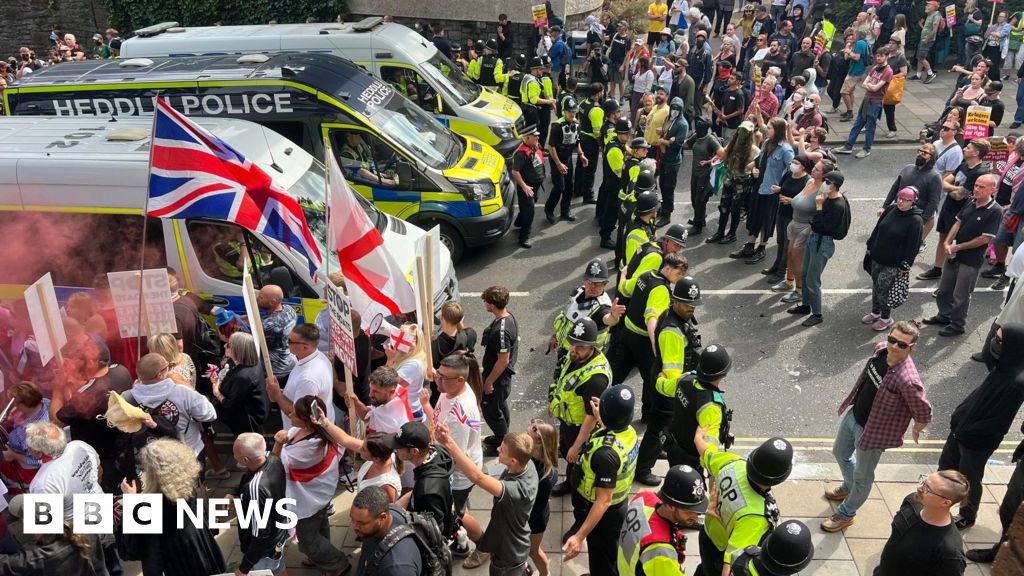 Woman released after arrest at Bristol immigration protest - BBC News