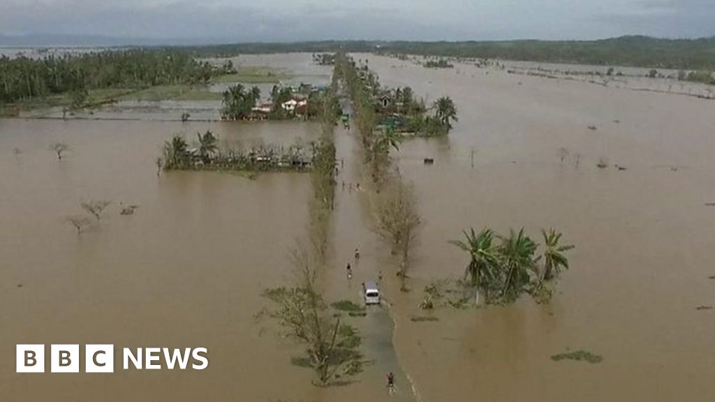 Philippines typhoon: Aerials show submerged areas - BBC News