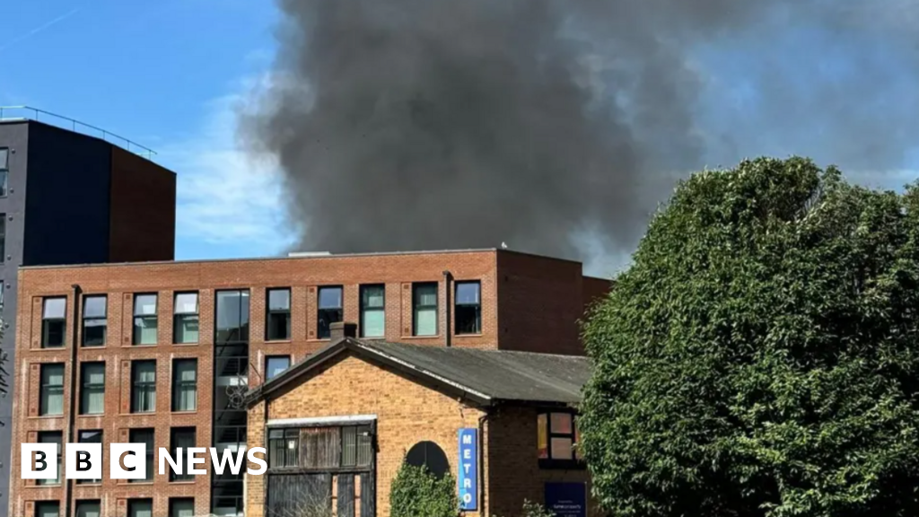 Birmingham: Man rescued from industrial yard fire - BBC News