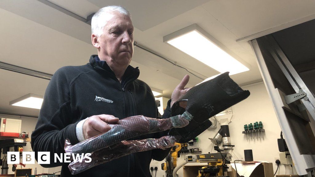 Man builds wife 'exoskeleton' after cancer surgery - BBC News