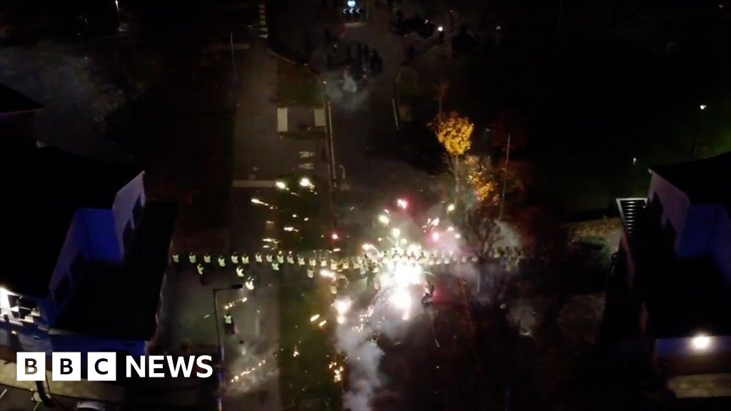 Drone video shows fireworks being fired at police - BBC News
