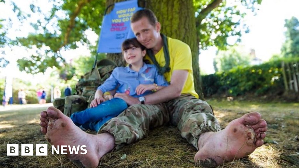 Army major completes 1,000-mile barefoot walk in aid of daughter