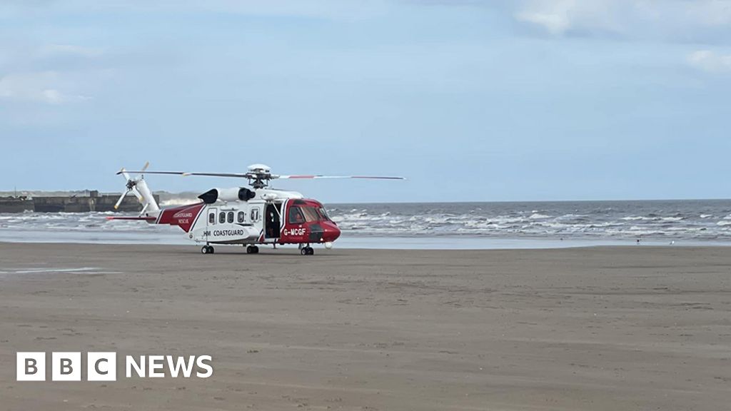 Coastguard helicopter rescues kite surfer off Bridlington - BBC News