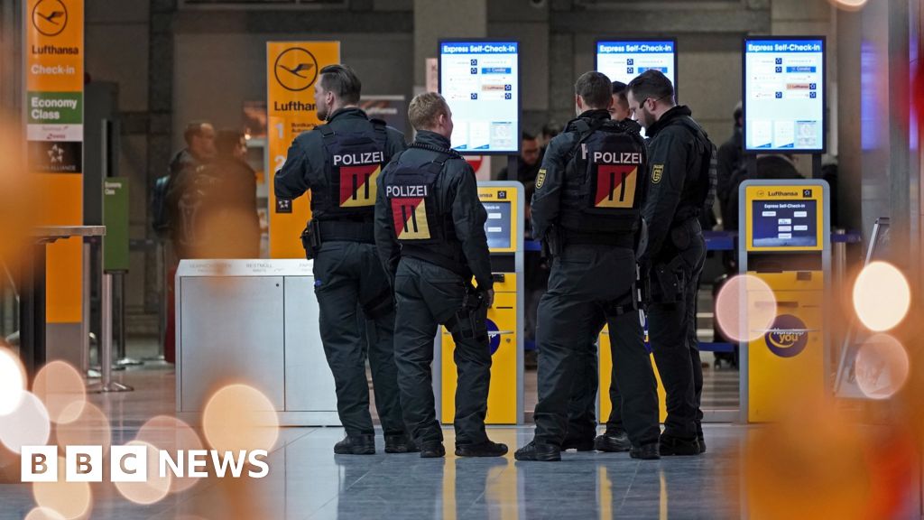 German airports on alert amid spying reports at Stuttgart - BBC News