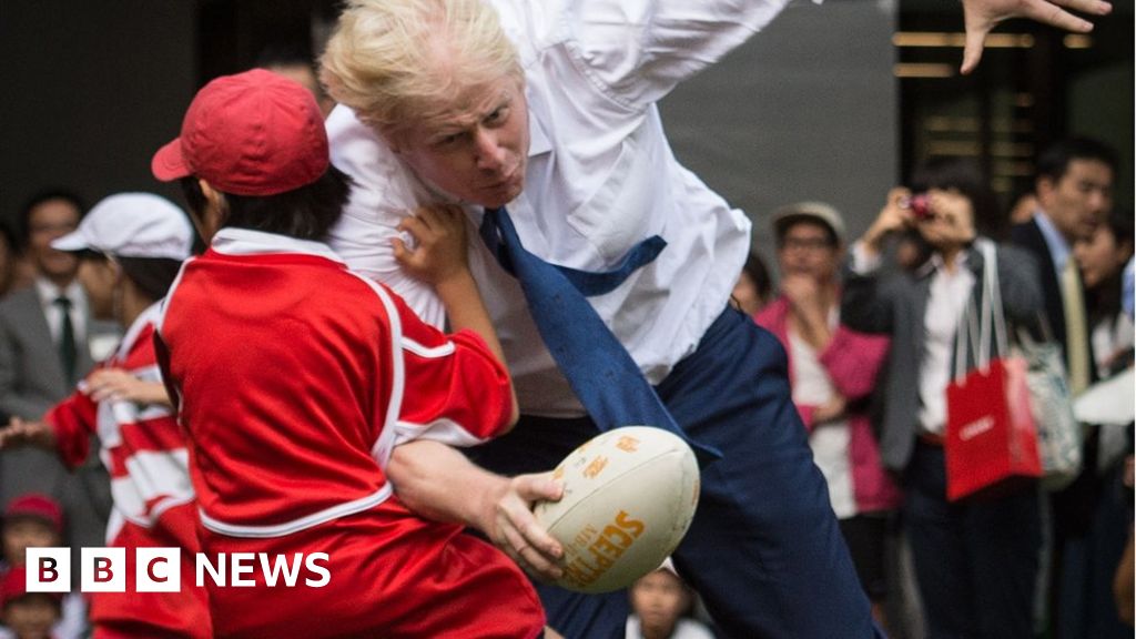Boris Johnson knocks child to ground in touch rugby - BBC News