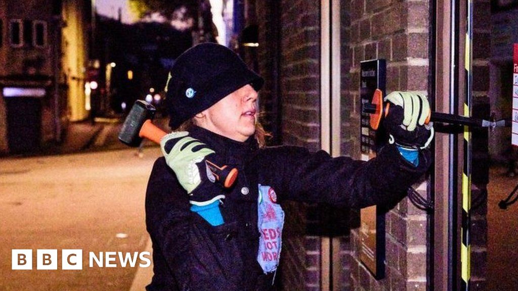 Extinction Rebellion co-founder fined for smashing Barclays window