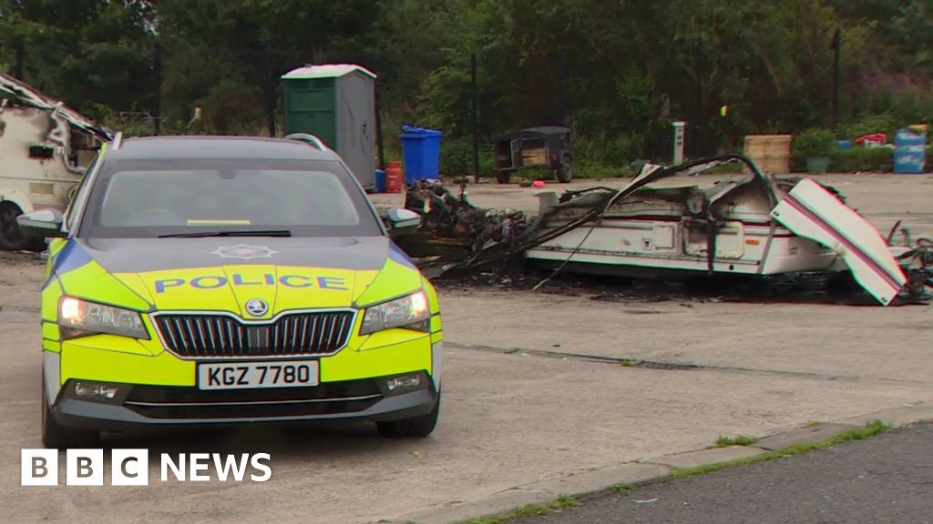 Caravans destroyed in suspected arson attack in Racecourse Road - BBC News