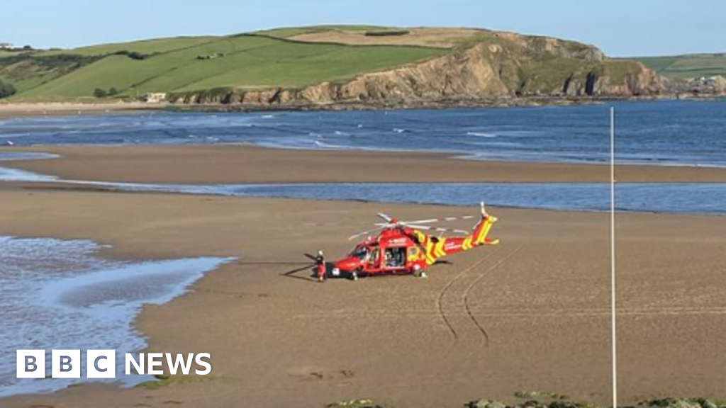Man airlifted from beach after 'medical episode' - BBC News