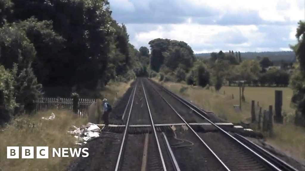 Foot crossing: Train narrowly misses group of walkers