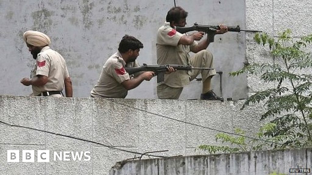 India police station siege ends with nine killed - BBC News
