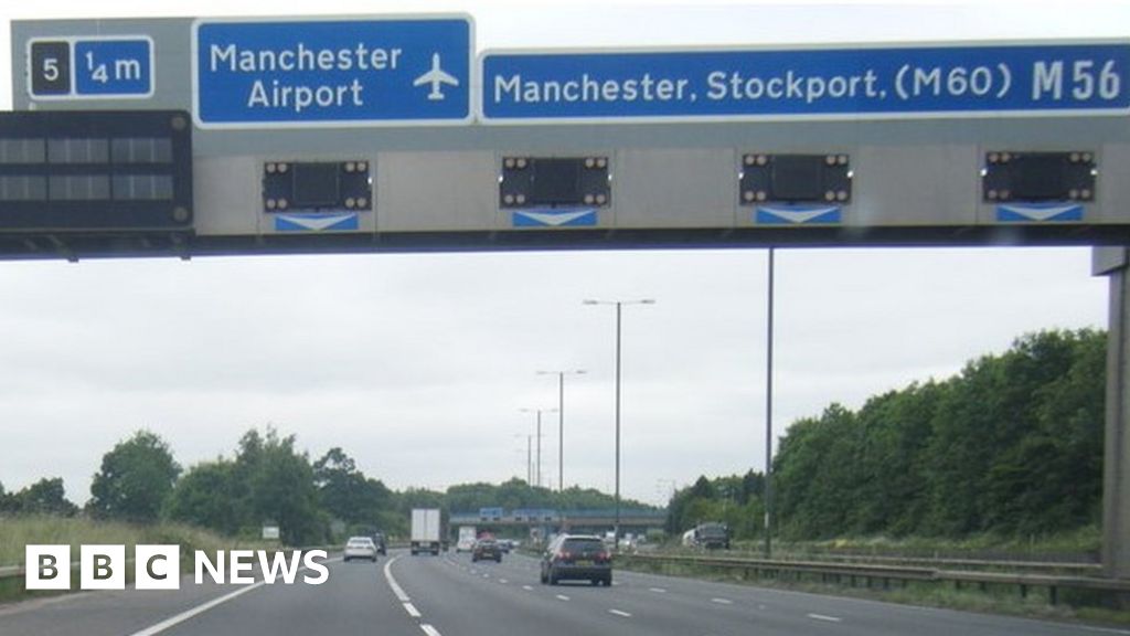 Man on M56 bridge disrupts Manchester Airport traffic - BBC News