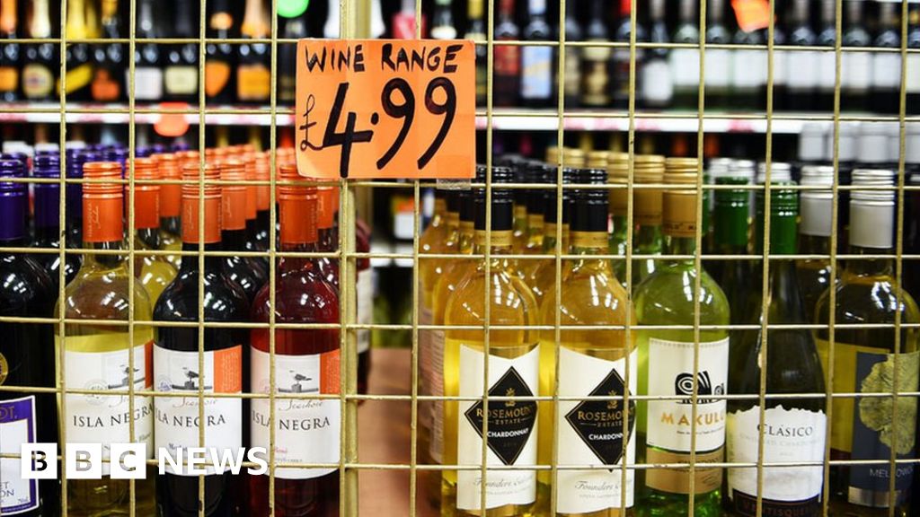 Scottish alcohol sales drop as minimum price kicks in - BBC News