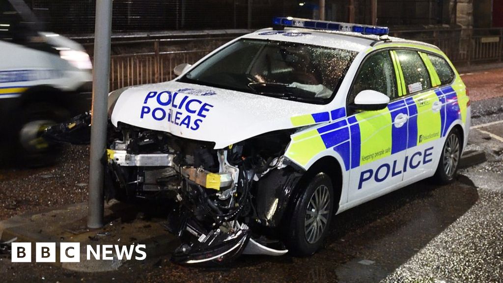 Police car extensively damaged after traffic light crash - BBC News