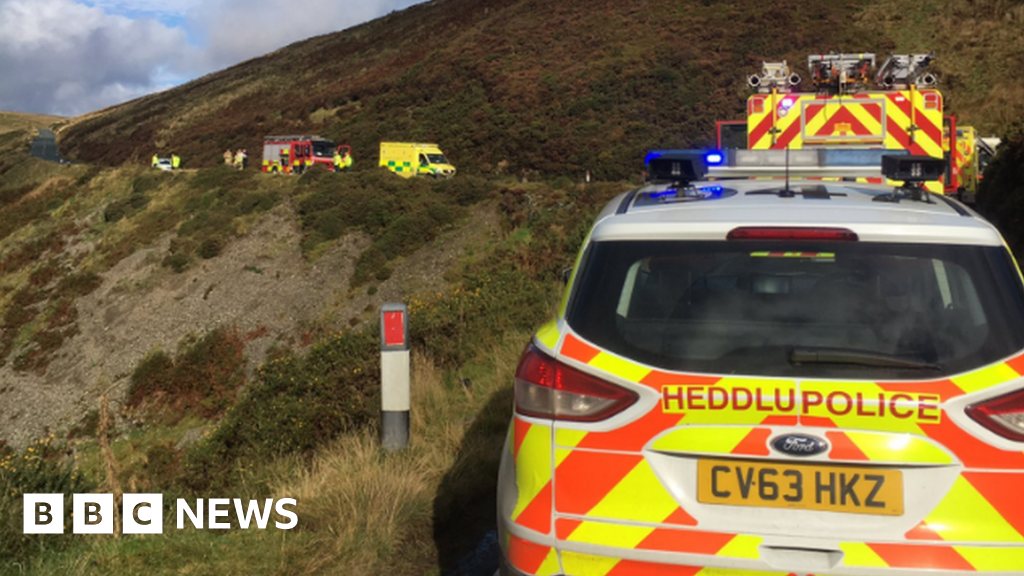 Van plunges 200m down mountainside after lorry crash - BBC News