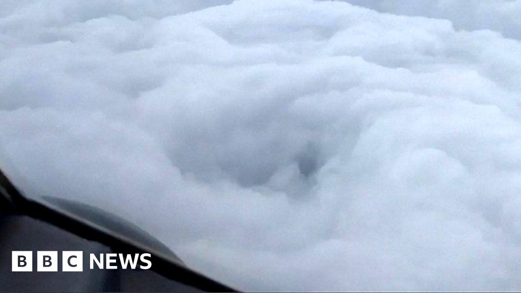 Hurricane Irma: Plane flies over eye of storm - BBC News