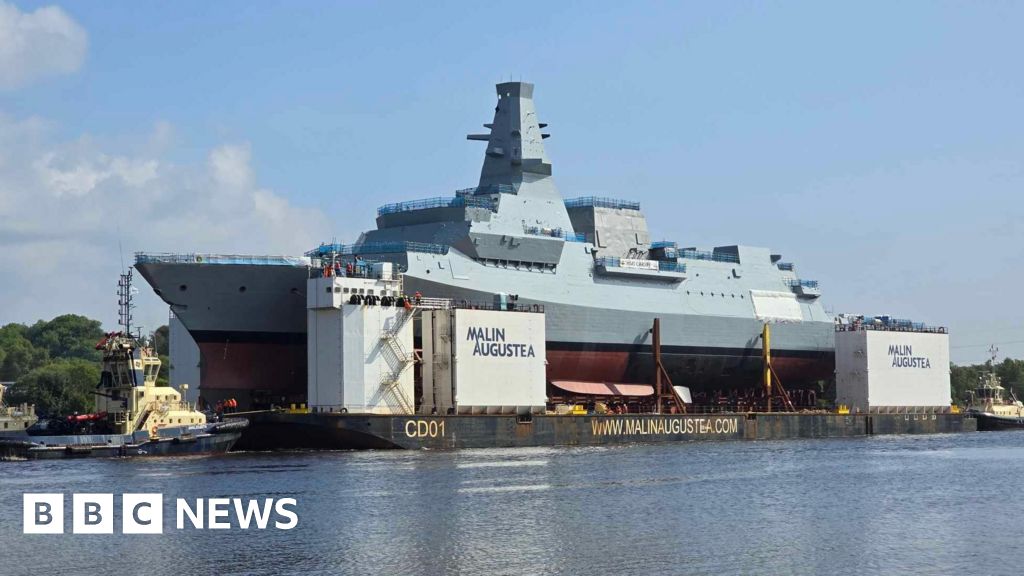 New Navy frigate HMS Cardiff makes first journey on giant barge - BBC News