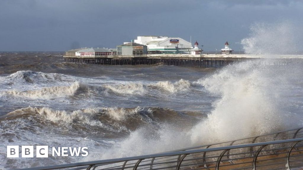 Woman swept into sea on Blackpool promenade - BBC News