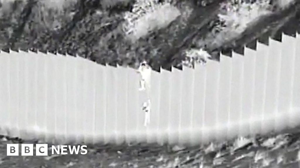 Children dropped over US border wall - BBC News