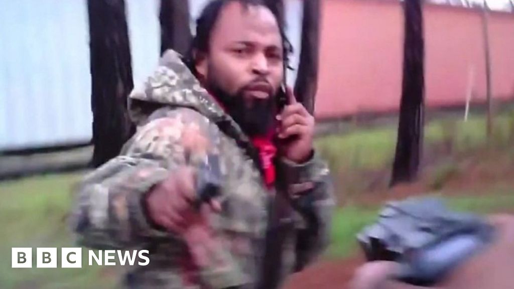 US police officer records moment he is shot at close range