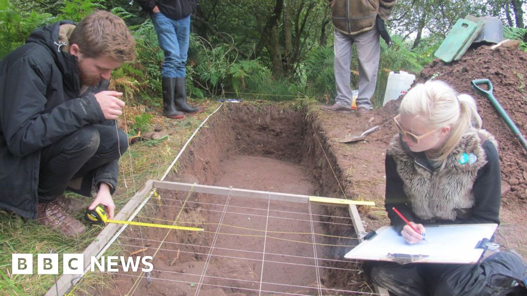 Prehistoric Cochno Stone unearthed near housing estate - BBC News