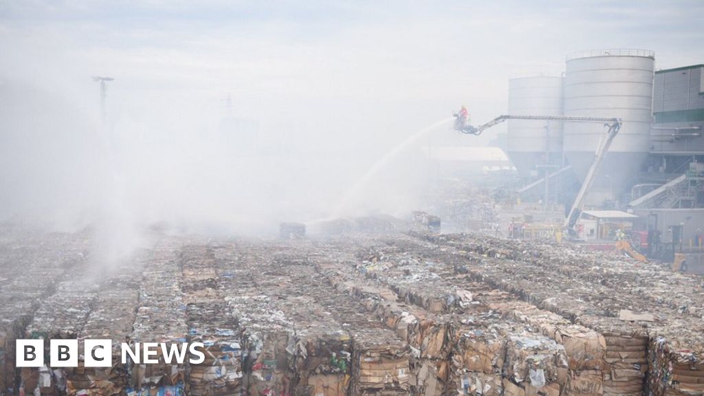 Crews tackle large fire at Manchester paper factory - BBC News